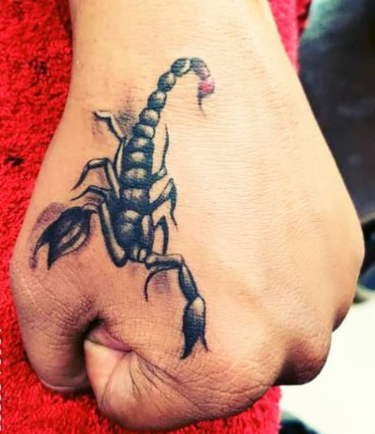 Simple Scorpion Tattoo On Hand